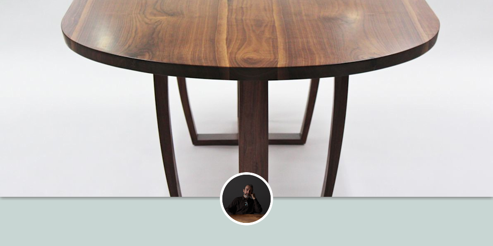Oval walnut table, Trapeze leg, with book-matched top. by Jonathan ...