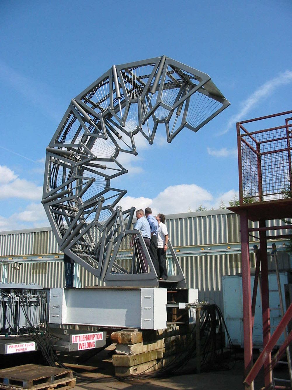 Rolling Bridge by Heatherwick Studio seen at Paddington Basin, London ...