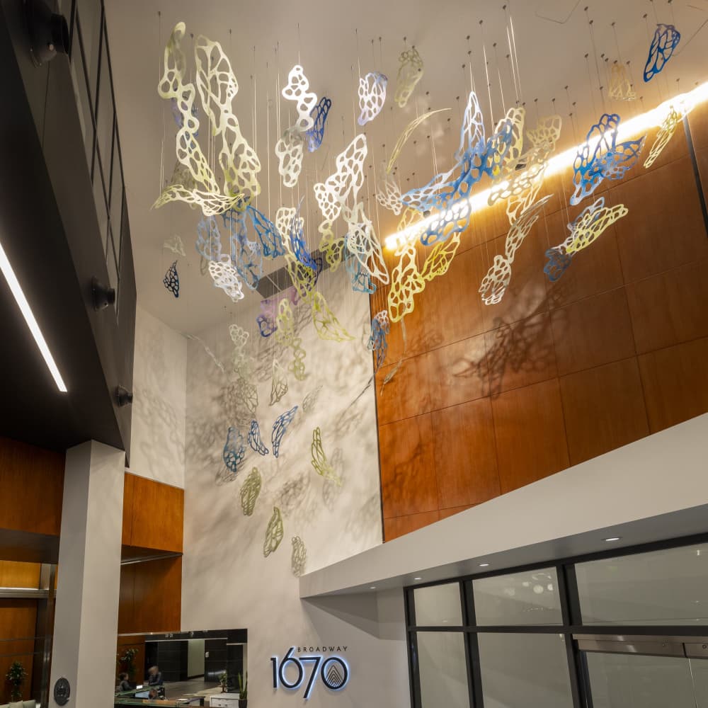 "Play of Light" suspended sculpture by Jane Guthridge at 1670 Broadway ...