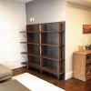 Custom Walnut Shelving Unit with Hidden Closet Door by Joe Cauvel of ...